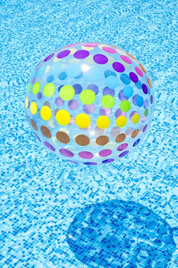 Inflatable Colourful Ball Floating in Blue Swimming Pool Water ...