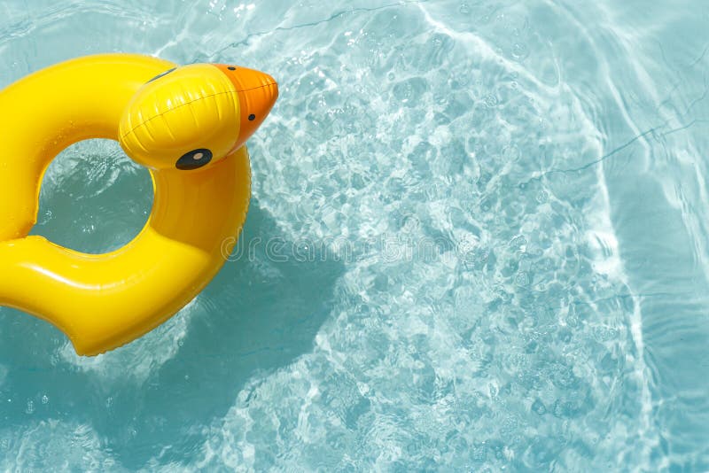 Inflatable Float Rubber Ring in the Shape of a Yellow Duckling in Blue ...