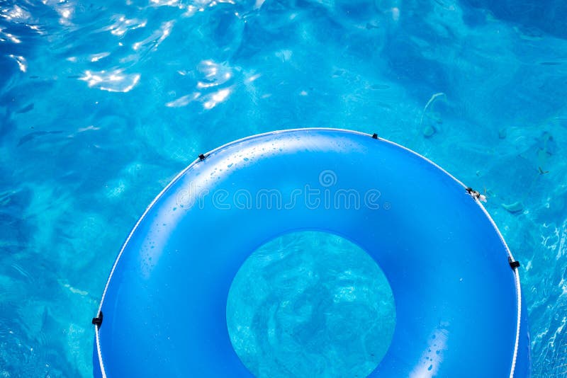 Inflatable Plastic Ring Floating Above a Pool on a Hot Summer Day Stock ...