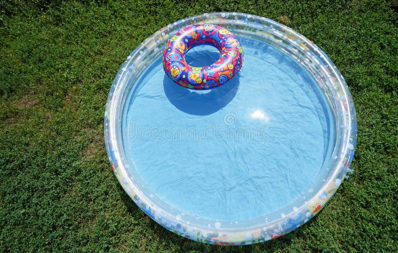 Inflatable Pool for Children on Green Grass, Top View Stock Photo ...