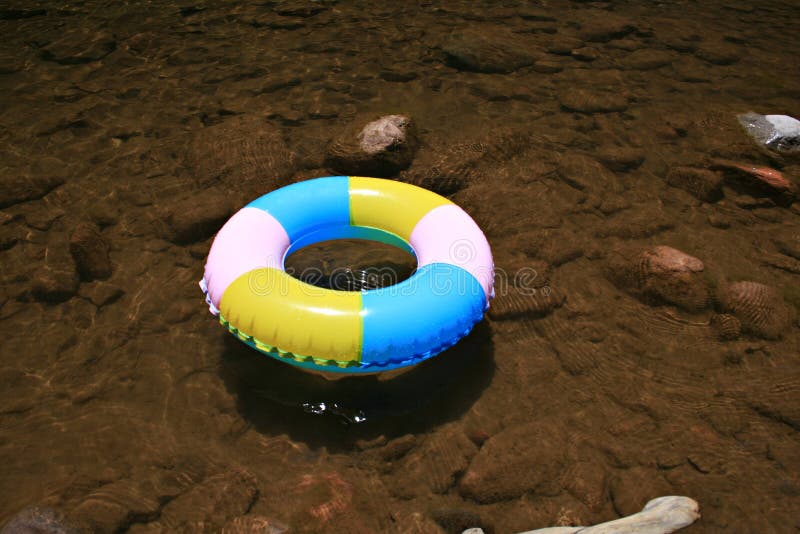 Inflatable Pool Toy in Stream Stock Image - Image of water, plastic ...