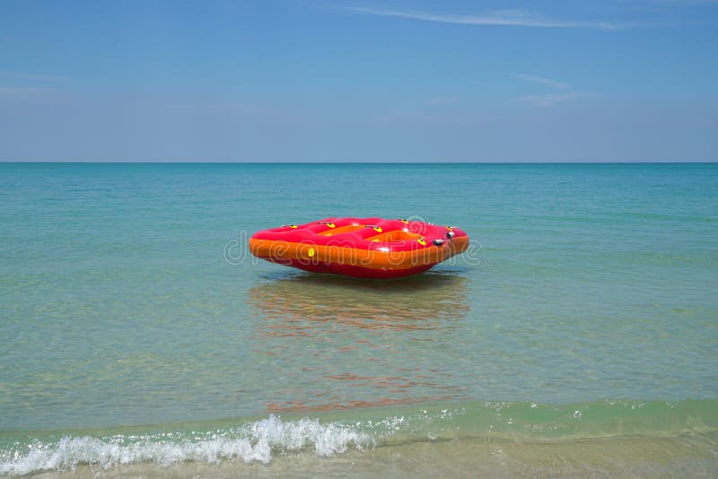 Inflatable Ring or Lilo in the Sea by the Beach Stock Image - Image of ...