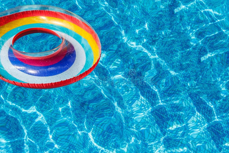 Inflatable Water Activities Circles Tuba Float on the Water in the Pool ...