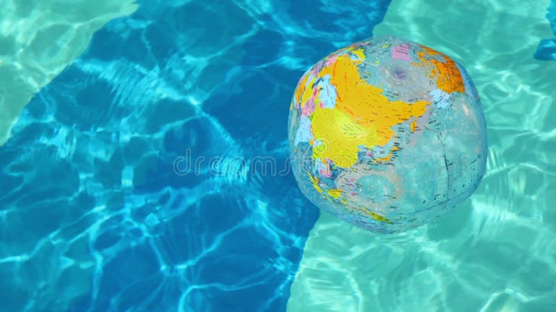 Inflated Ball with Earth Map Floats on Wavy Water Stock Video - Video ...