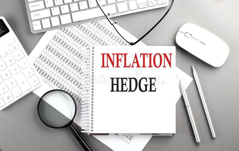 INFLATION HEDGE Text on Notepad on Chart with Keyboard and Calculator ...