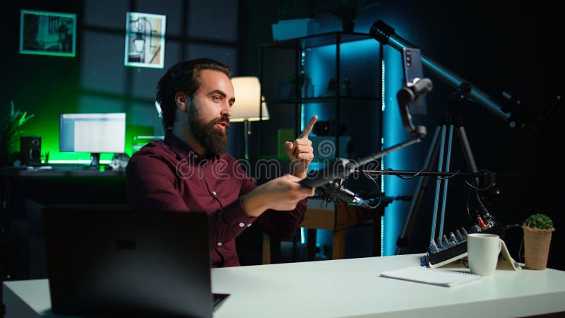 Influencer Doing Peace Sign in Front on Cellphone Attached To Selfie ...