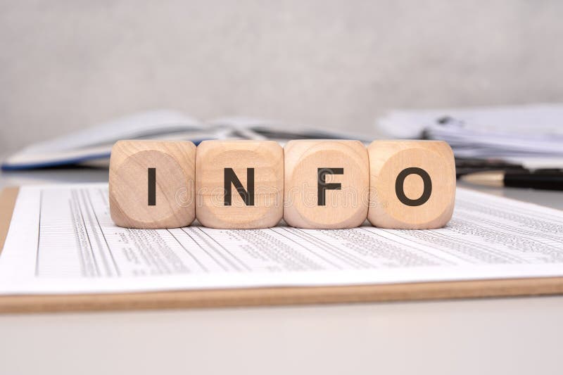 Information Blocks on Top of Desk Surrounded by Papers and Documents ...