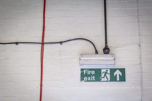 Information Plate for Emergency Exit during Fire. Stock Image - Image ...