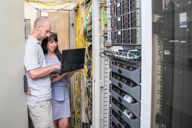 Racks with Computer Server Devices. Hosted Services are in the ...