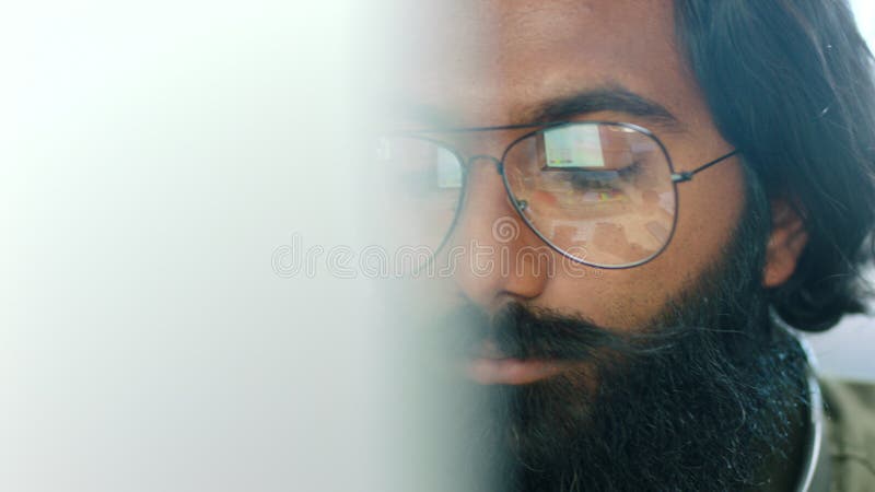 Coding Computer Screen And Pointing With Business People In Office Together From Back