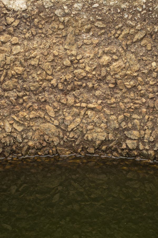 The Cylindrical Well Made of Granite Stone Wall Texture. Stock Photo ...