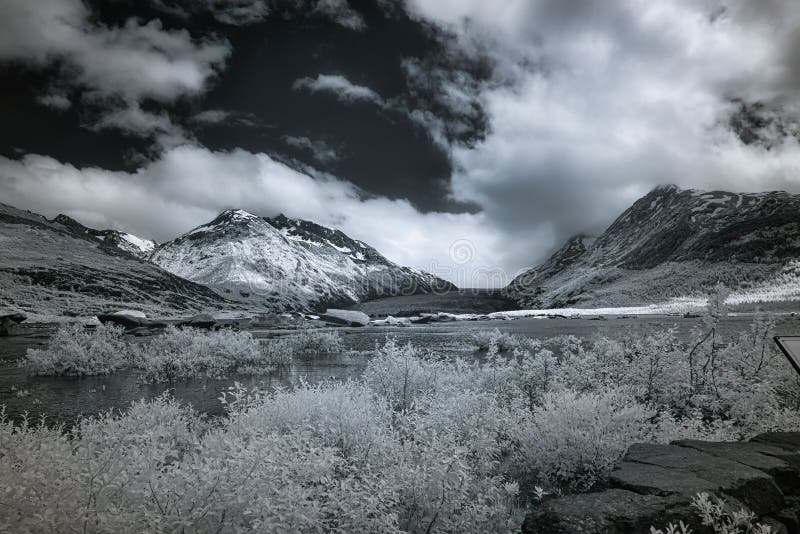 Infrared Mountain Landscape with Dramatic Clouds Stock Image - Image of ...