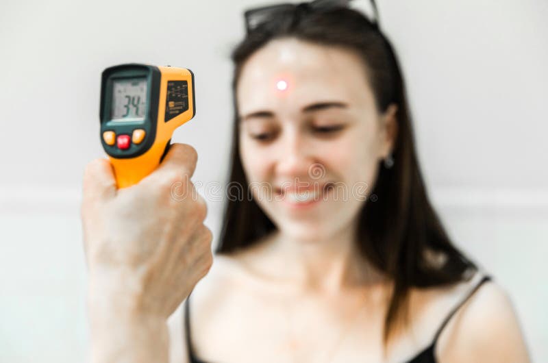Infrared Thermometer Checking Forehead Temperature Stock Image - Image ...