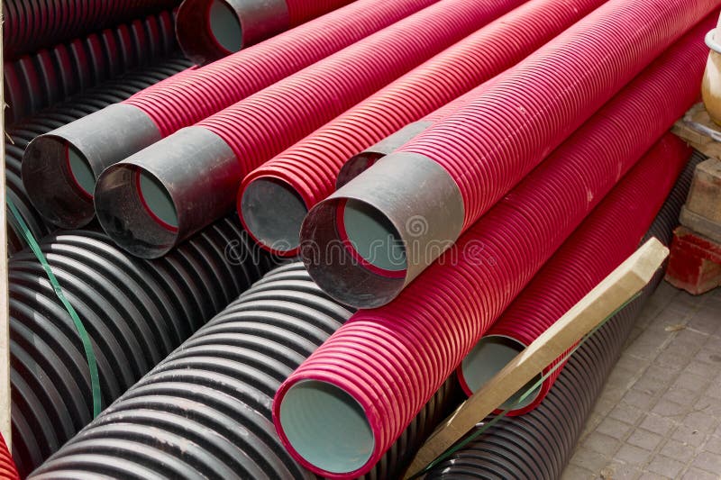 Infrastructure in Progress: Stacked Pipes Stock Photo - Image of ...