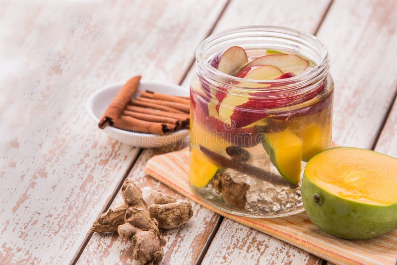 Infused Water Mix of Mango, Apple, Ginger and Cinnamon Stock Photo ...