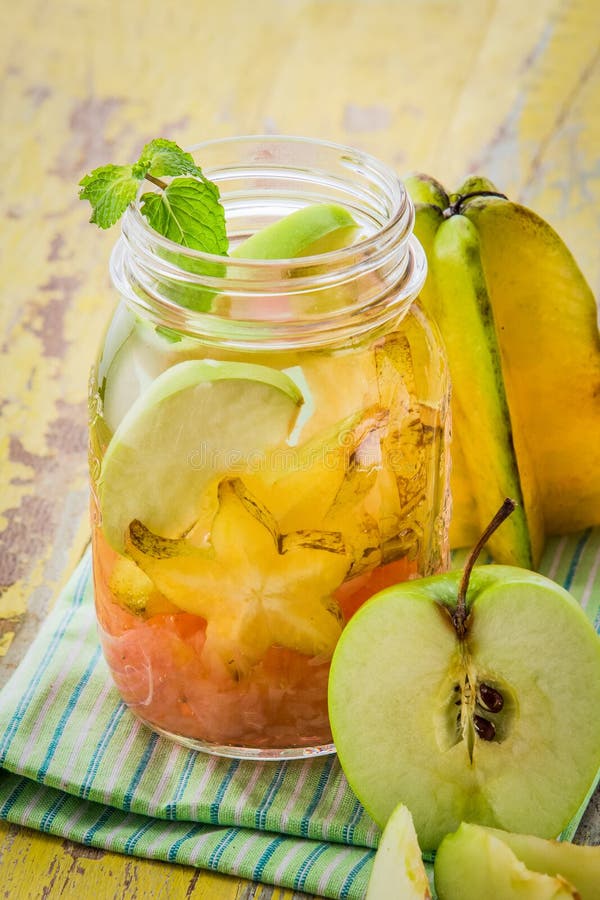 Infused Water Mix of Starfruit, Grapefruit, and Apple Stock Image ...
