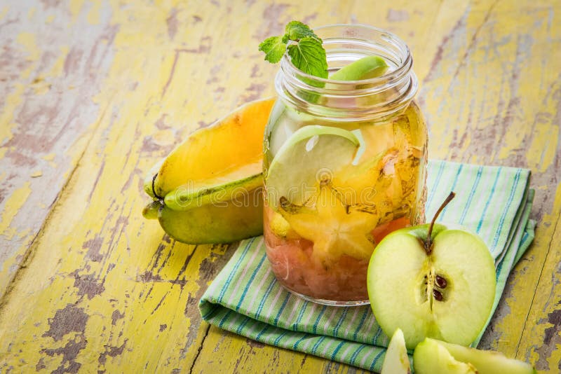 Infused Water Mix of Starfruit, Grapefruit, and Apple Stock Photo ...