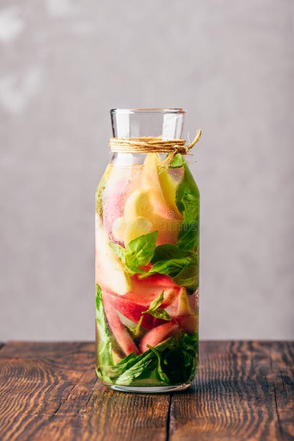 Infused Water with Peach and Basil. Stock Image - Image of peach ...