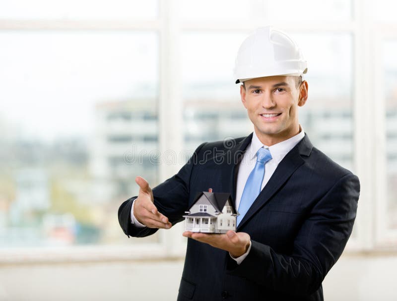 Ingeniero Que Señala En La Casa Modelo Foto de archivo - Imagen de ...