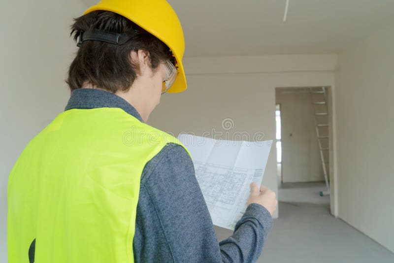 Ingineer with house plan stock photo. Image of plan - 267354802