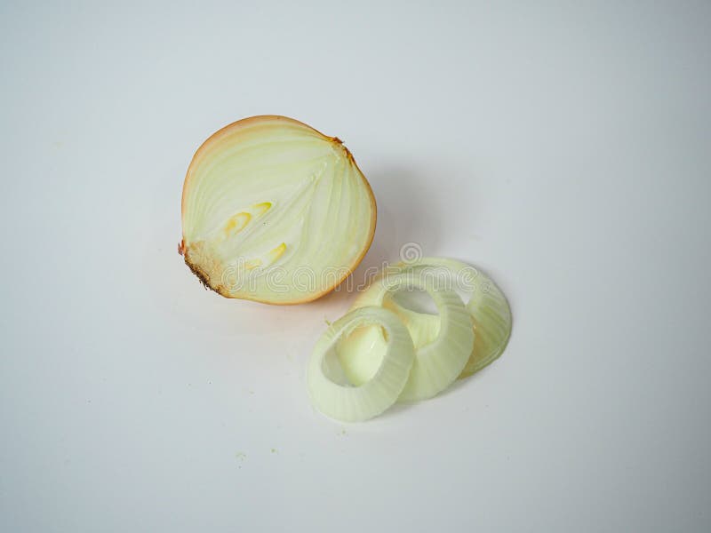 Yellow Onion Sliced in Half with Three Rings Separated for Presentation ...
