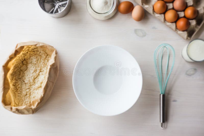 Ingredients for Baking Cake Laid Out on a White Wooden Table Stock ...