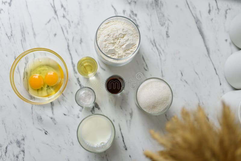 Ingredients for Baking in a Glass Container on the Marble Table.Top ...
