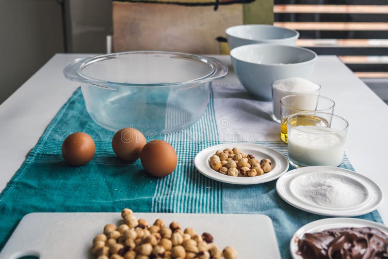 Ingredients for Baking Sweet Cake with Chocolate and Hazelnuts Stock ...