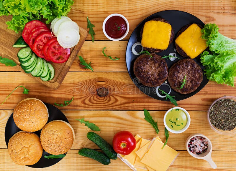 Ingredients for Burger on Wooden Background. Top View Stock Photo ...