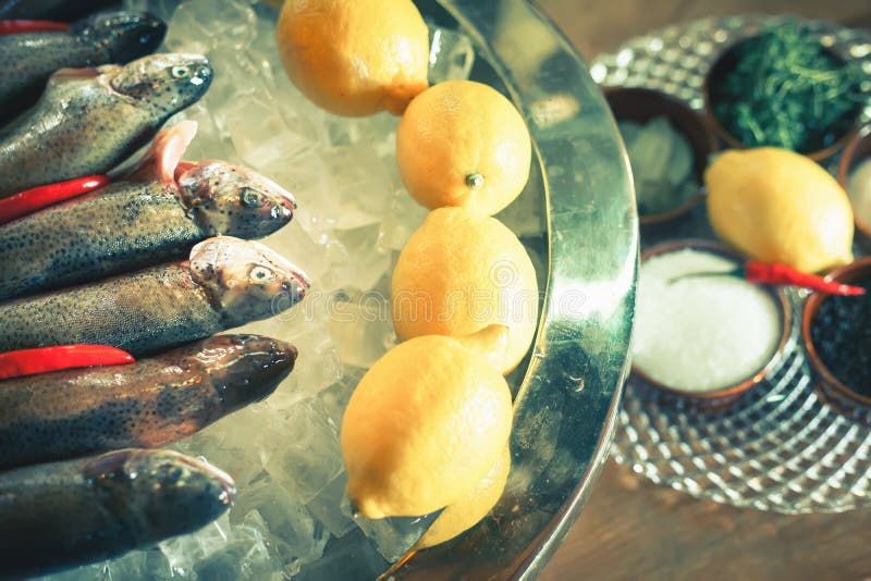 Ingredients for Cooking Trout, River Fish, with Lemon and Spices Stock ...