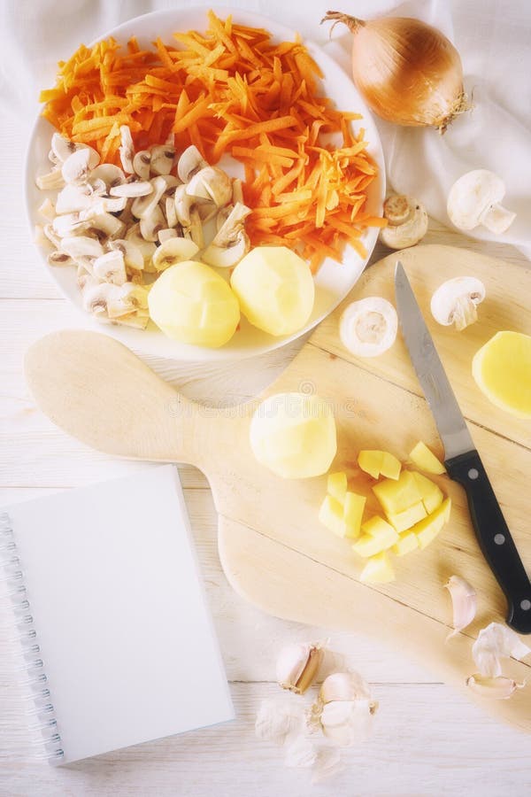 Ingredients for Soup and Notepad Stock Photo - Image of knife ...