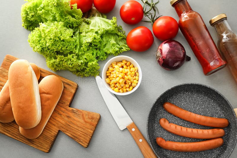 Ingredients for Tasty Hot Dogs on Table Stock Photo - Image of sauces ...
