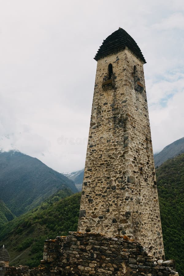 Ingush Watchtower on a Background of the Caucasus Mountains Stock Image ...