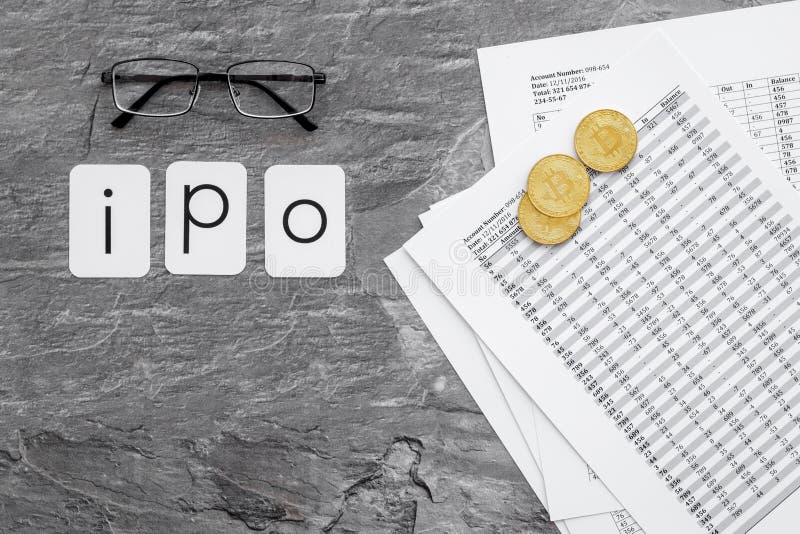 IPO with Coins and Calculation Table on Office Desk Gray Textured ...