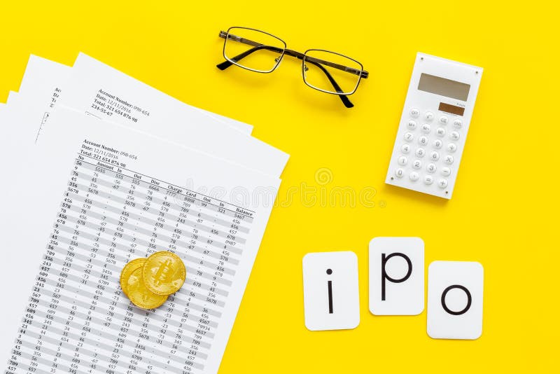 IPO with Coins and Calculation Table on Office Desk Yellow Background ...