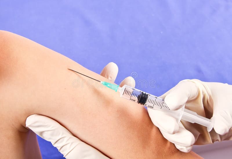 Injection given to a child stock image. Image of needle - 25891071