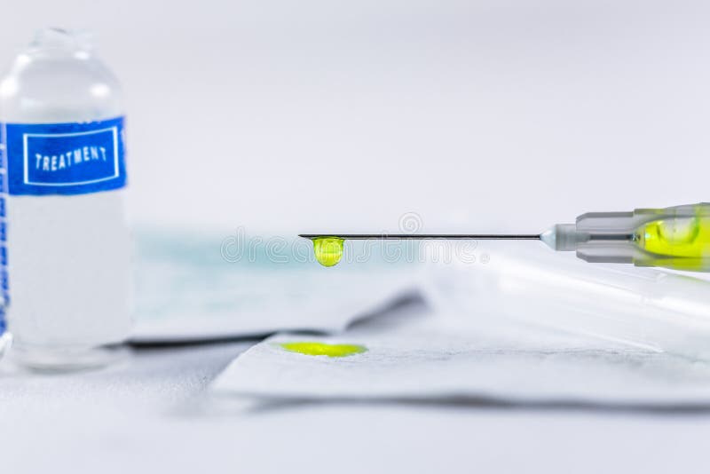 Injection with Medicine Drop at the End of the Needle. Stock Photo ...