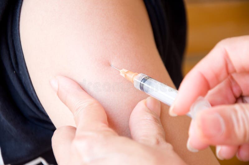 Injection stock photo. Image of therapy, syringe, sitting - 39976226