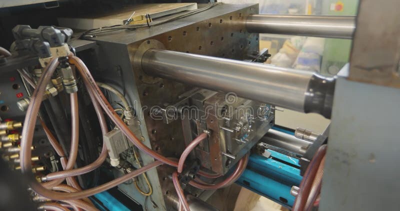 Injection Molding Thermoplastic Machine. the Process of Creating a ...