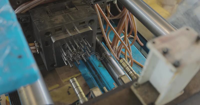 Injection Molding Thermoplastic Machine. the Process of Creating a ...