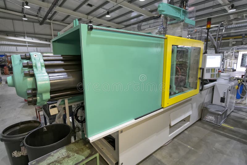 Injection moulding machine stock image. Image of injection - 27117421