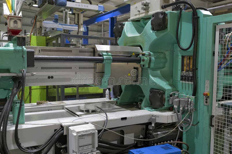 Injection moulding machine stock image. Image of injection - 27117421