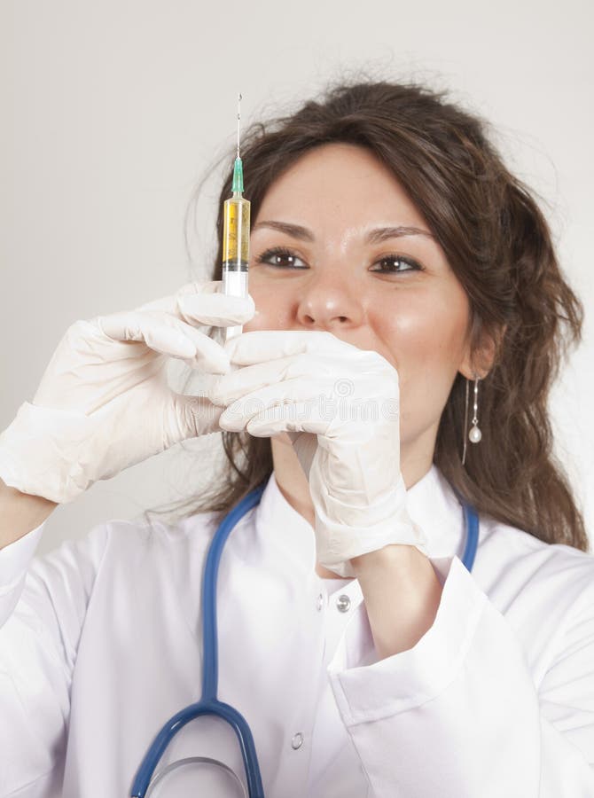 Injection preparing stock photo. Image of injection, doctor - 24238744