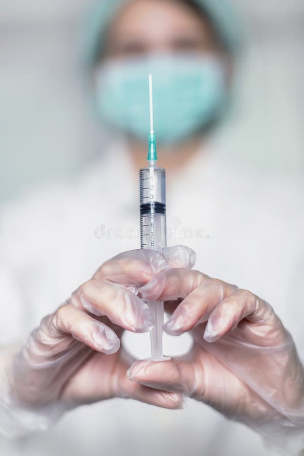 Injection, syringe in hand stock photo. Image of vaccine - 157238132