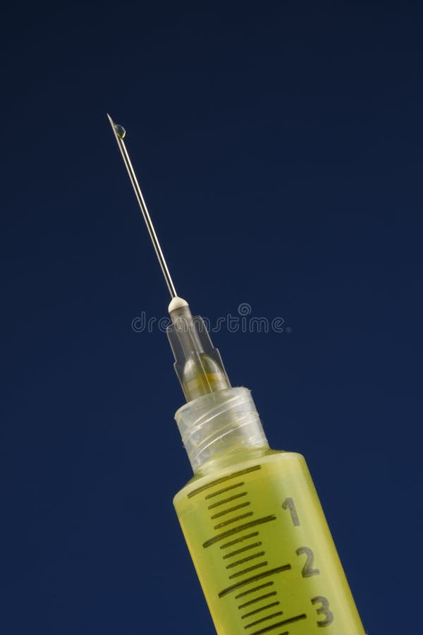 Injection Syringe with Needle Detail on Colored Background Stock Image ...