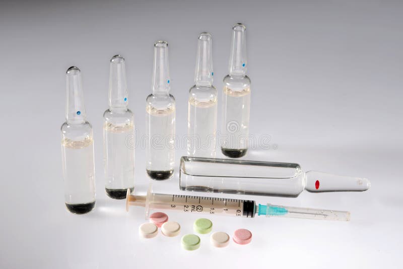 Injection and Syringe and Tablets Stock Photo - Image of fever ...