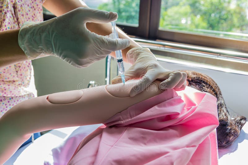 Injection to patient model stock image. Image of clinic - 42290027