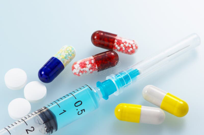 Injector and medicines. stock image. Image of reflection - 40005847