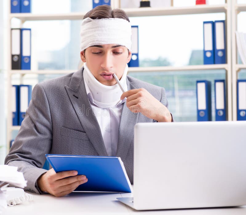 Injured Businessman Working in the Office Stock Photo - Image of body ...