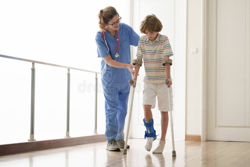 Injured Child on Crutches. Boy in Cast on Foot Stock Image - Image of ...